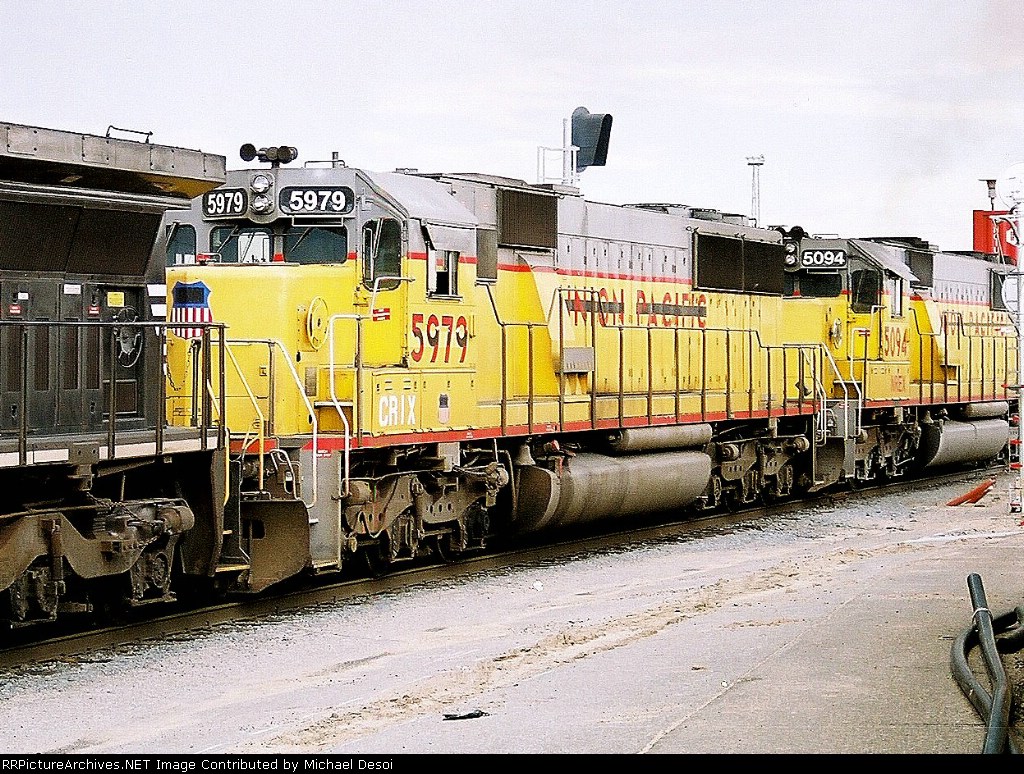 CRIX SD-60 #5979 is second out in this westbound leaving the yard